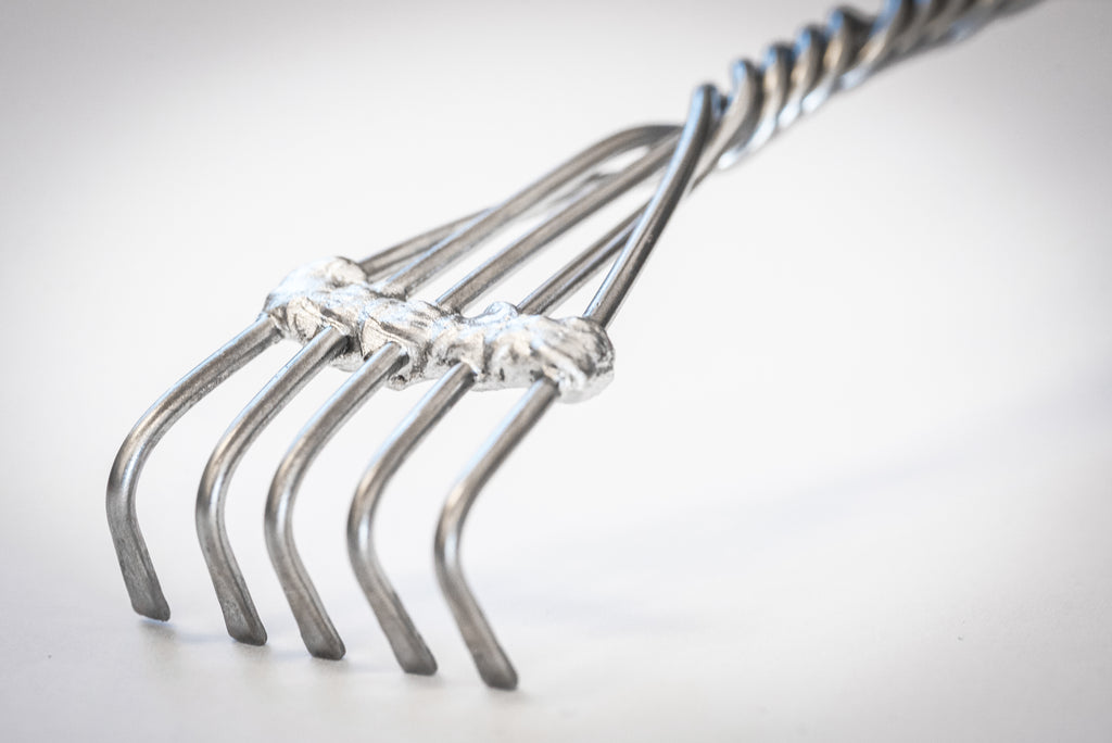 Heavy Duty Silver Fingers back scratcher is tough and long, yet bendab ...